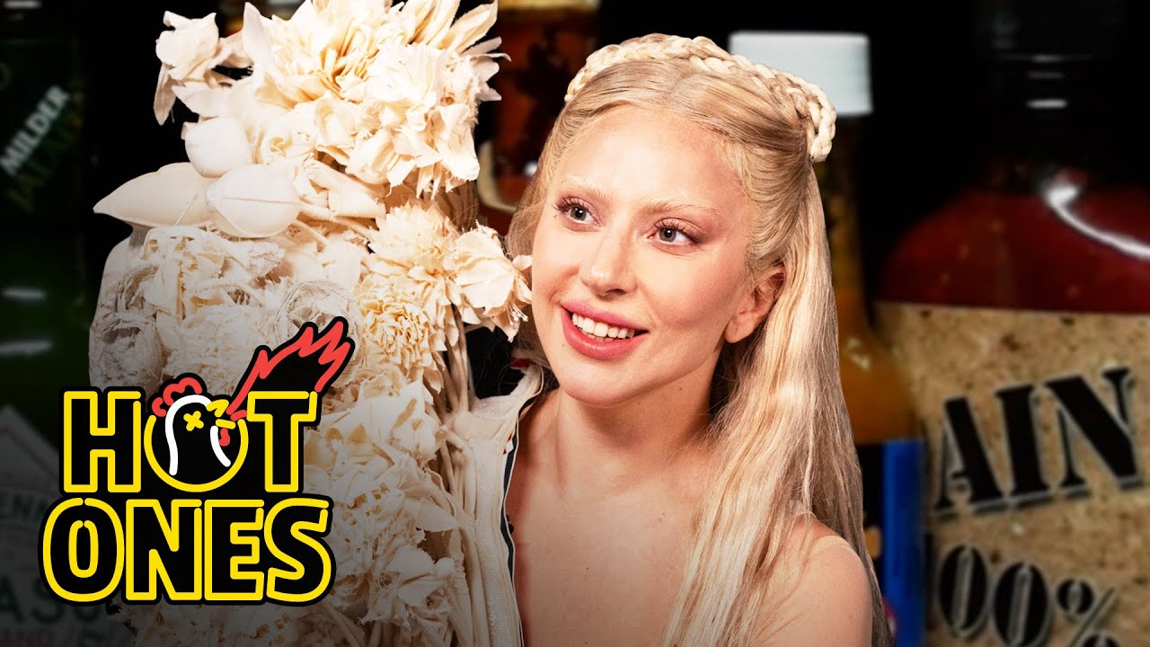OMG, WATCH: Lady Gaga tries to keep a poker face while eating spicy wings on HOT ONES - OMG.BLOG